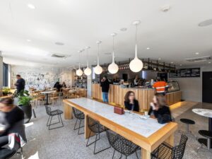 Brunetti owner buys cafe, factory from landlord – realestatesource